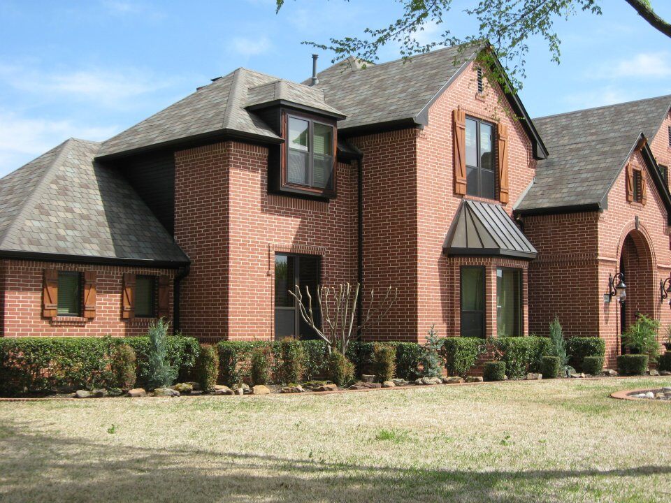 Brennan Traditions Vinyl Windows in Bronze